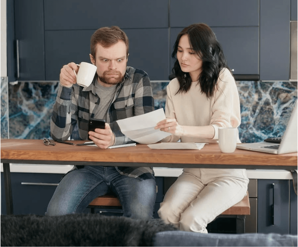 a-man-looking-at-the-paper - Atchuup! - Cool Stories Daily
